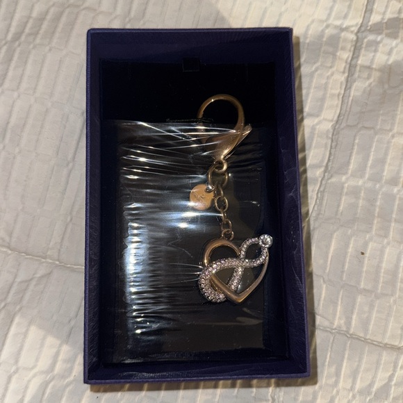 Swarovski | Accessories | Infinite Bag Charminfinity And Heart White ...